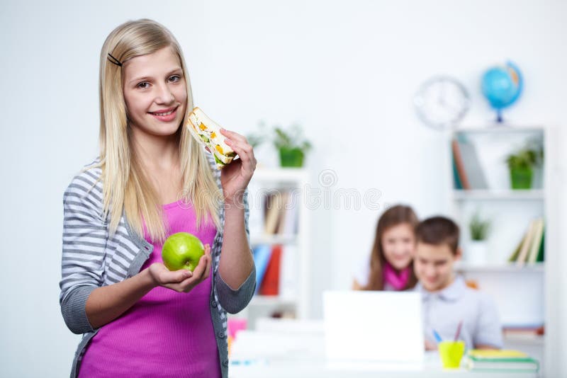 Student with food stock photo. Image of girl, junk, background - 25940644