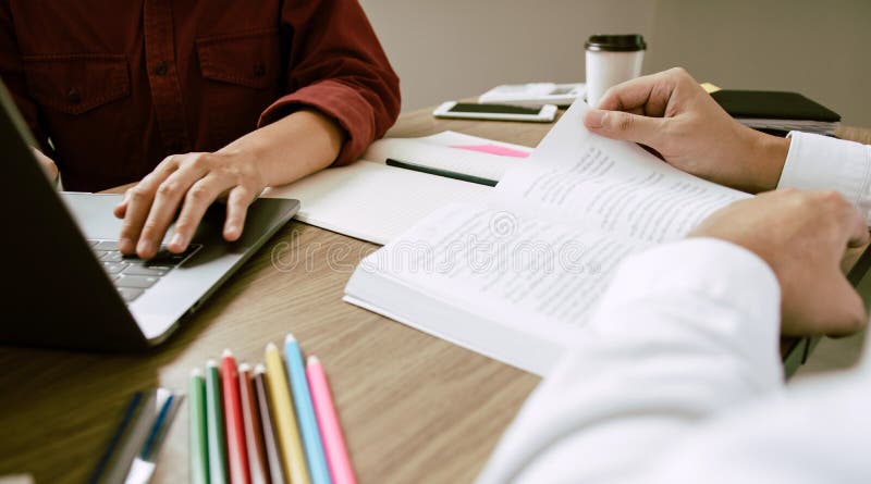 Student Friends are Using Laptop Searching for Information about ...
