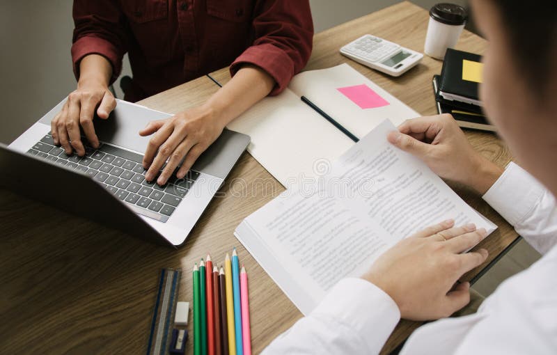 Student Friends are Using Laptop Searching for Information about ...