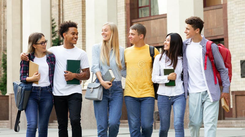 Student Friends Walking in University Campus, Copy Space Stock Photo ...