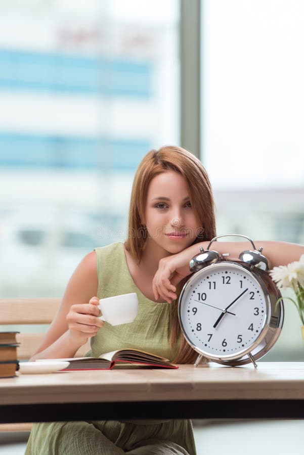 The Student with Gian Alarm Clock Preparing for Exams Stock Photo ...