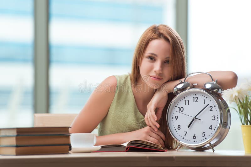 The Student with Gian Alarm Clock Preparing for Exams Stock Photo ...