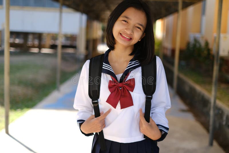 Student Girl with Backpack Standing at School Stock Image - Image of ...