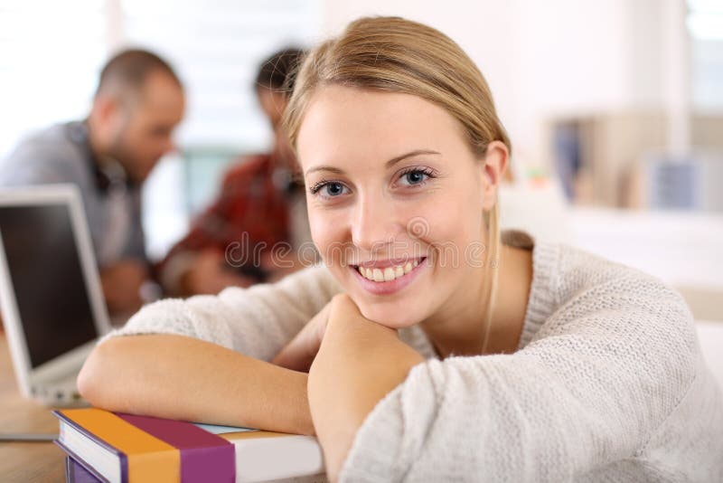 Student Girl with Book in Classroom Taking Break Stock Image - Image of ...