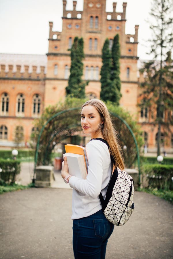 Student Girl with Book in University Outfoors Stock Photo - Image of ...