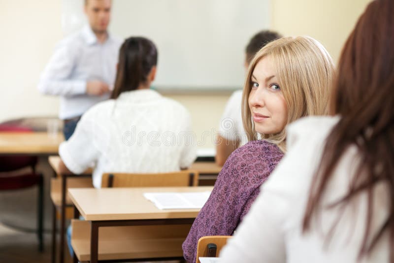 Student girl on class stock image. Image of female, male - 34669313