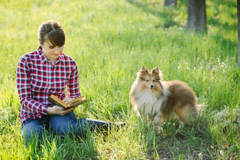 Student Girl Learning in Nature with Dog Stock Photo - Image of relax ...