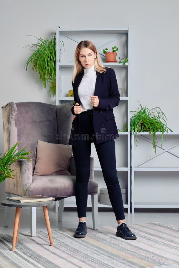 Student Girl Posing in Jacket, Jaens and Pullover at Home Stock Image ...