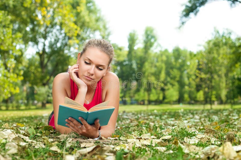 Student Girl Reading Book Outdoor Stock Photo - Image of autumn, book ...