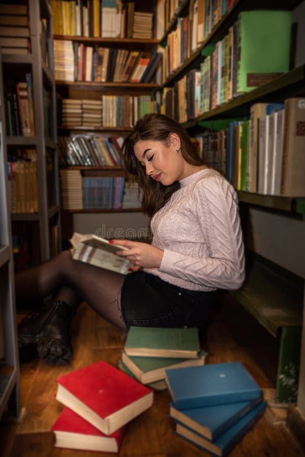 Student Girl Reading Book at University Library Stock Photo - Image of ...