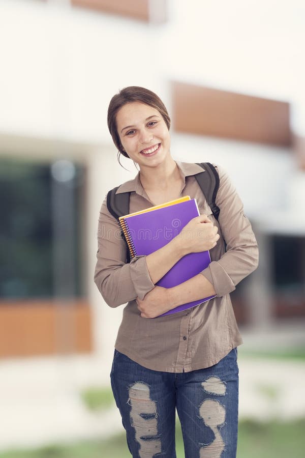 Student girl at school stock photo. Image of girl, holding - 71514456