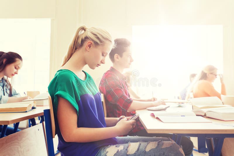 Student Girl with Smartphone Texting at School Stock Photo - Image of ...