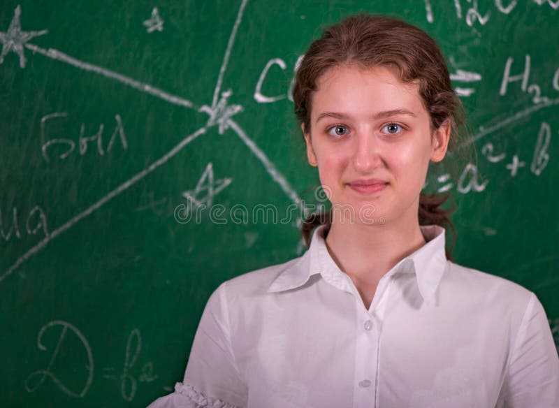 Student Girl Standing Near Clean Blackboard in the Classroom Stock ...