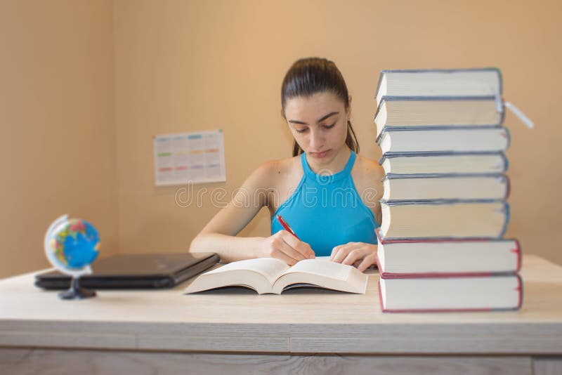 Student, Girl Studying at Home with a Lot of Books Stock Photo - Image ...