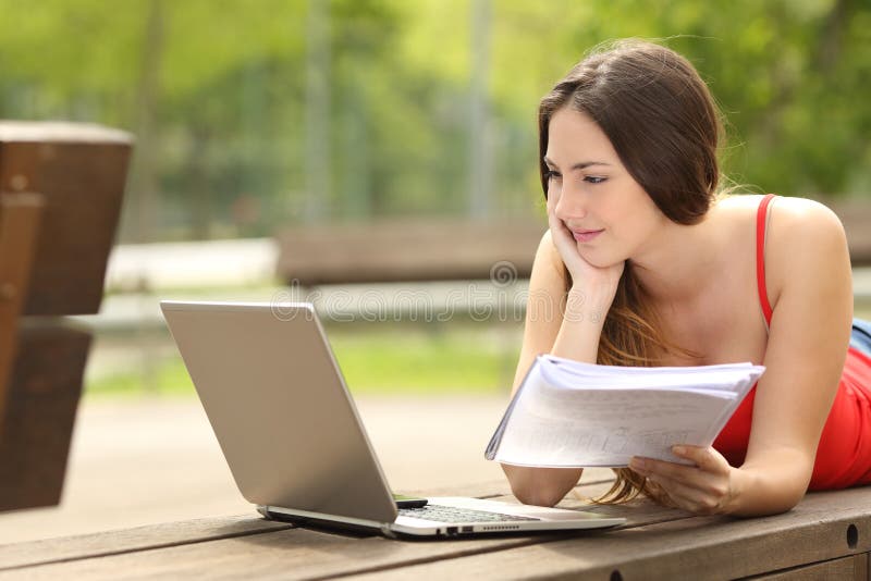 Student Girl Studying with a Laptop in an University Campus Stock Photo ...