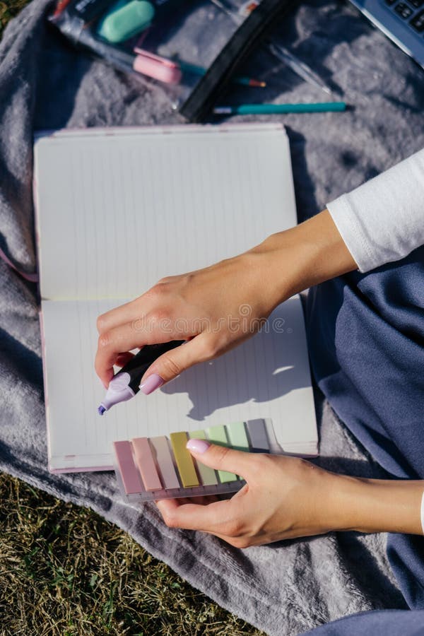 Student Girl is Studying Outside at the Summer Holliday at the ...