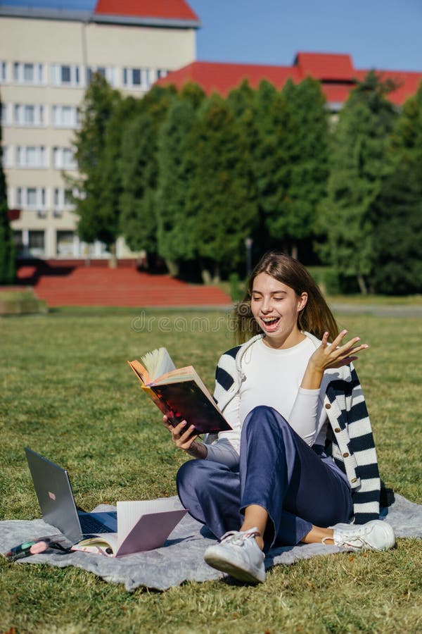 Student Girl is Studying Outside at the Summer Holliday at the ...