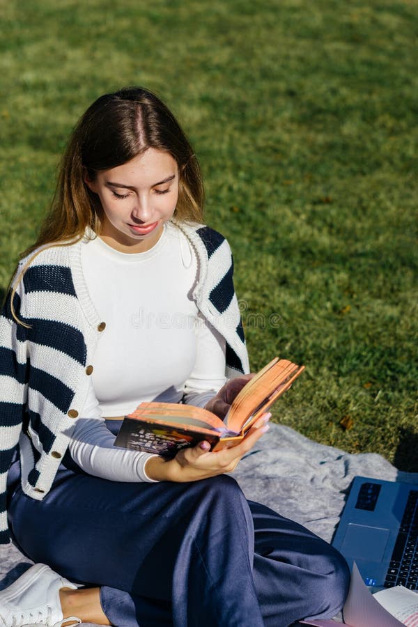Student Girl is Studying Outside at the Summer Holliday at the ...