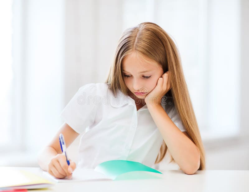 Student Girl Studying at School Stock Photo - Image of childhood ...