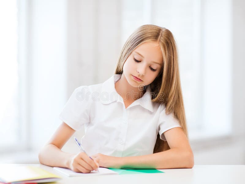 Student Girl Studying at School Stock Photo - Image of notebooks ...