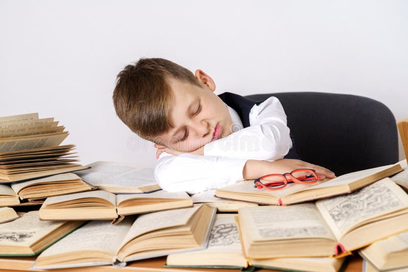 The Student Got Tired Doing Homework and Fell Asleep on Books Stock ...