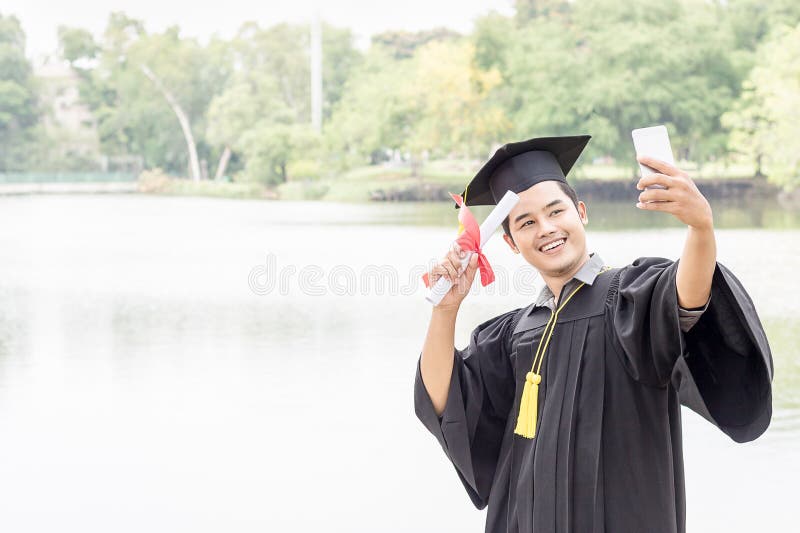 Student Graduate Holding Smart Phone Stock Photo - Image of check ...