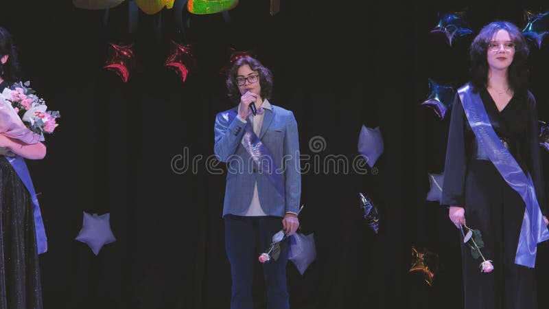 Schoolboy Wearing a Sash Giving a Speech during His Graduation Ceremony ...