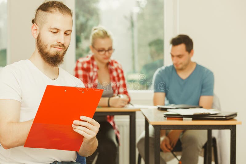 Student Guy in Front of Her Mates in Classroom Stock Photo - Image of ...