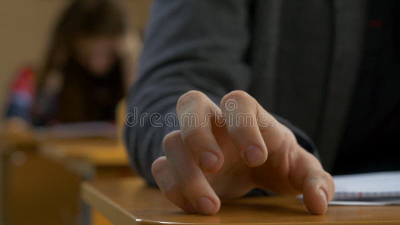 Student Hand Finger Tapping Closeup. Young Man Taps His Fingers on a ...