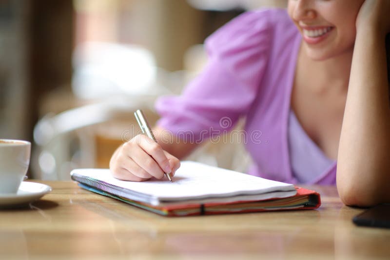 Student Hand Taking Notes in a Bar Stock Image - Image of homework ...