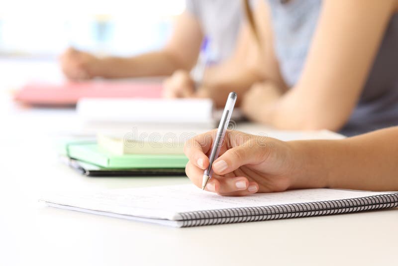 Student Hand Taking Notes in a Classroom Stock Image - Image of fingers ...