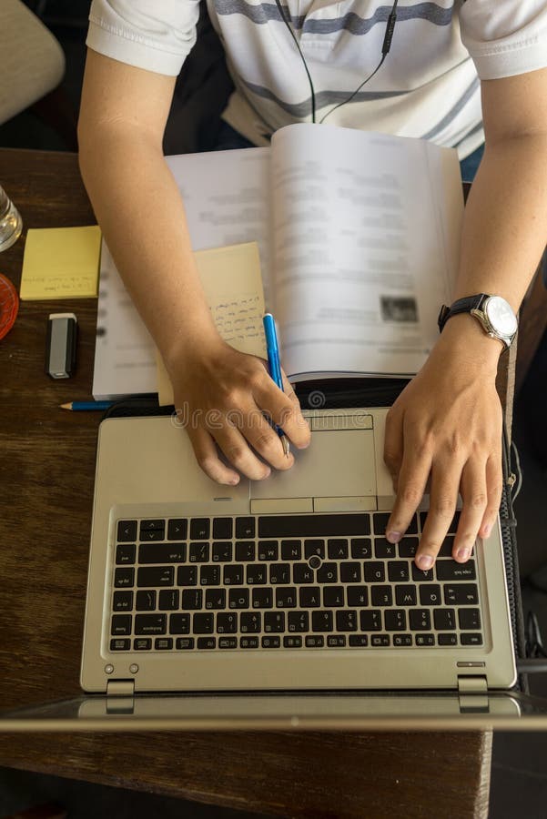 High Angle View of Student Hand Using Laptop while Studying Stock Image ...