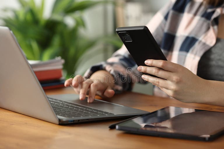 Student Hands Using Multiple Devices on Wooden Table Stock Photo - Image of high, online: 384652016