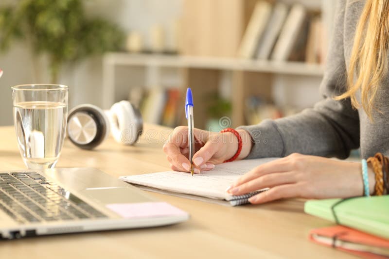 Student Hands Writing on Notebook Doing Homework Stock Image - Image of ...