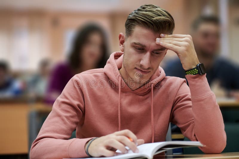 The Student Has a Headache in Class Stock Image - Image of homework ...