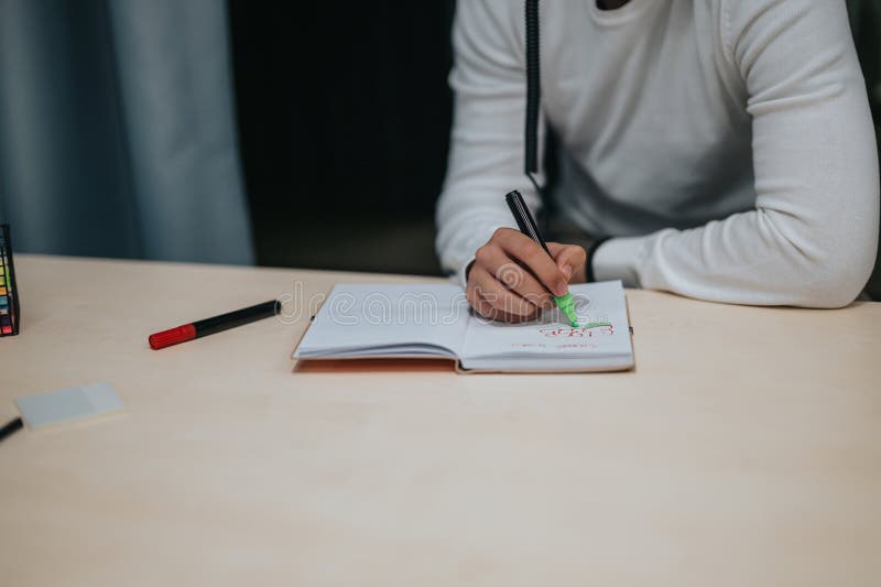 Student Highlighting Notes in a Classroom Setting Stock Image - Image ...