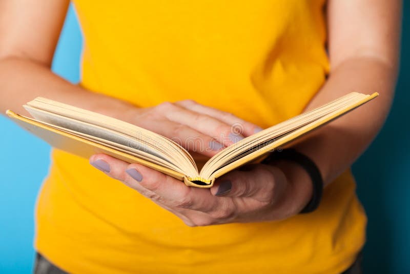Student Hold Book in Hands and Read Text. Personal Education Stock ...