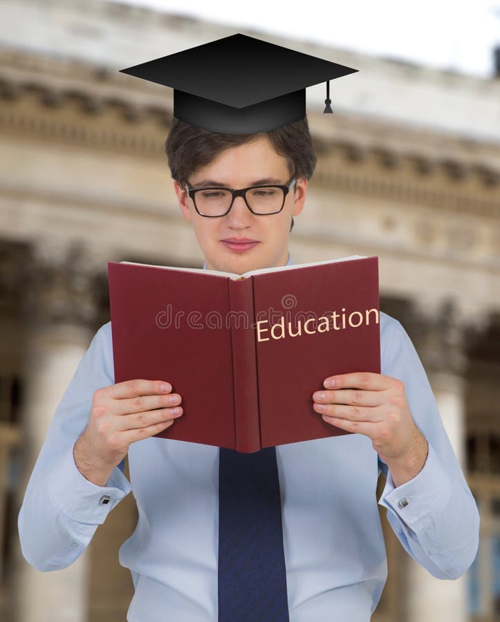 Student holding book stock photo. Image of achievement - 50623316