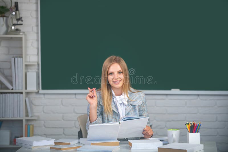Student Holding Book Preparing Exam and Learning Lessons in School ...