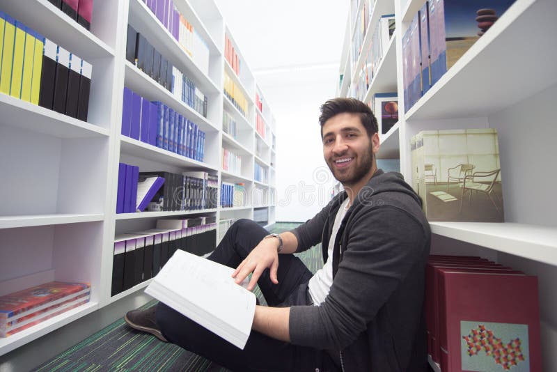 Student Holding Lot of Books in School Library Stock Image - Image of ...