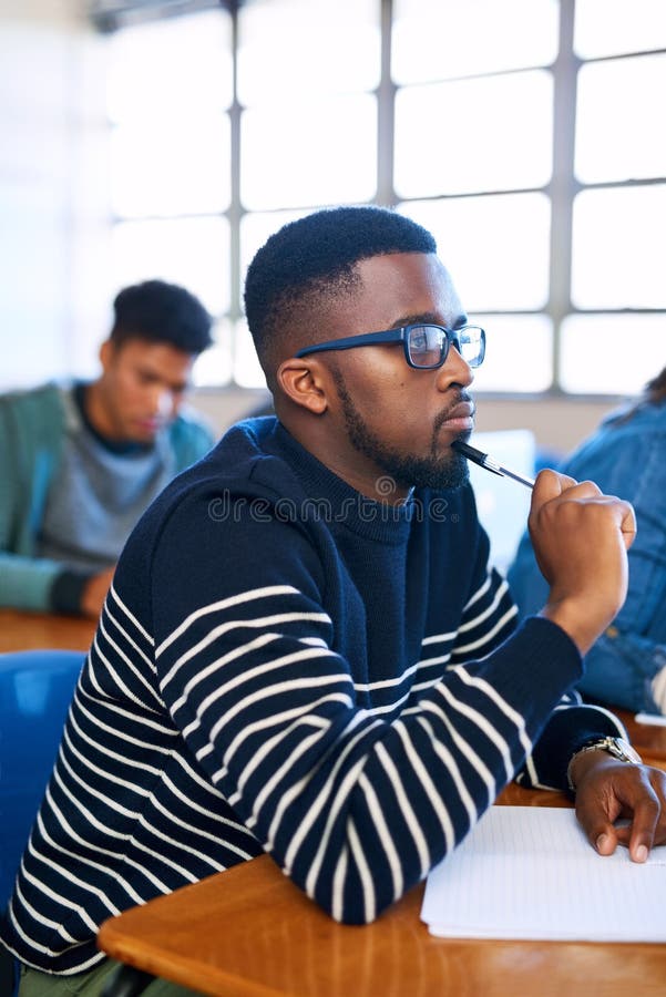 Student, Idea and Black Man in College Classroom for Education, Test or ...