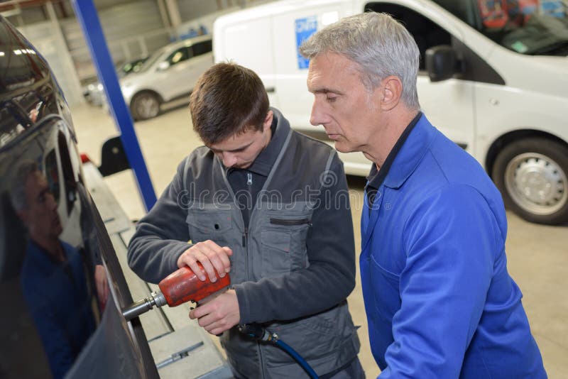 Student with Instructor Repairing Car during Apprenticeship Stock Image ...