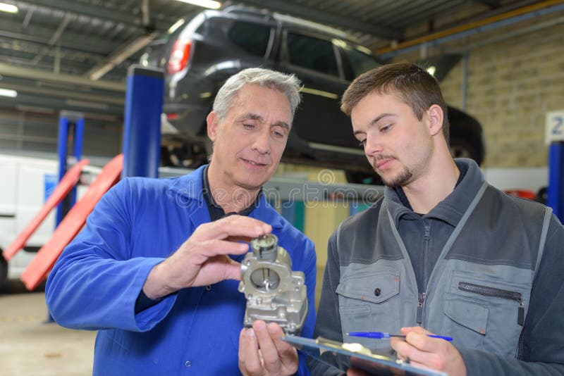 Student with Instructor Repairing Car during Apprenticeship Stock Image ...