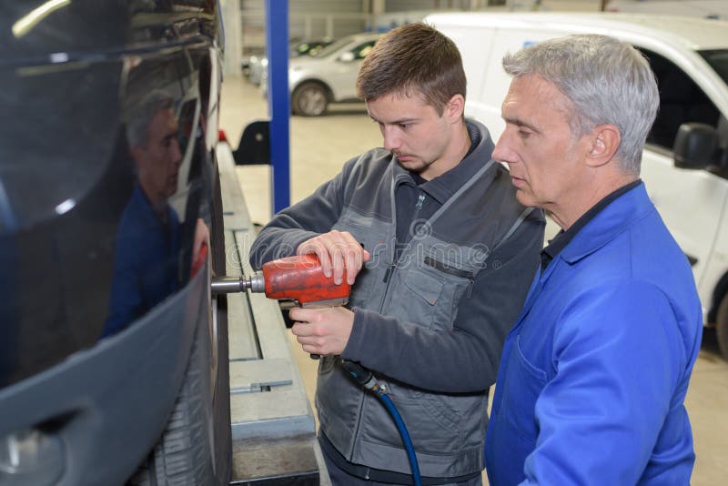 Student with Instructor Repairing Car during Apprenticeship Stock Photo ...