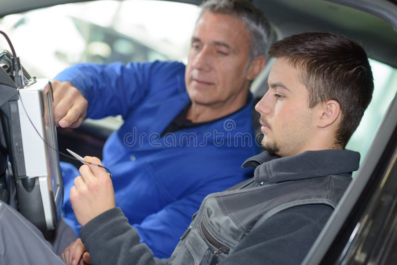 Student with Instructor Repairing Car during Apprenticeship Stock Photo ...