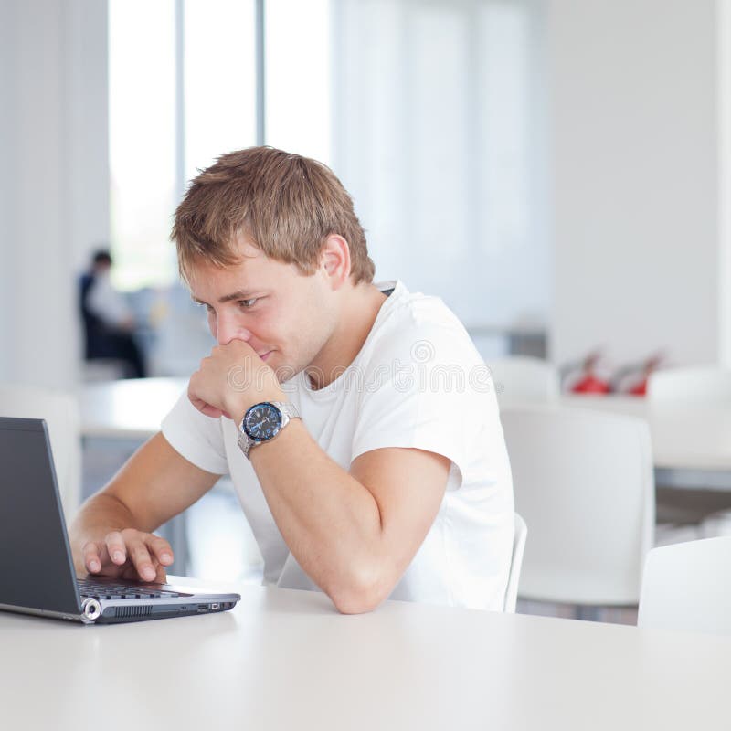 Student with Laptop Computer in Library Stock Image - Image of handsome ...