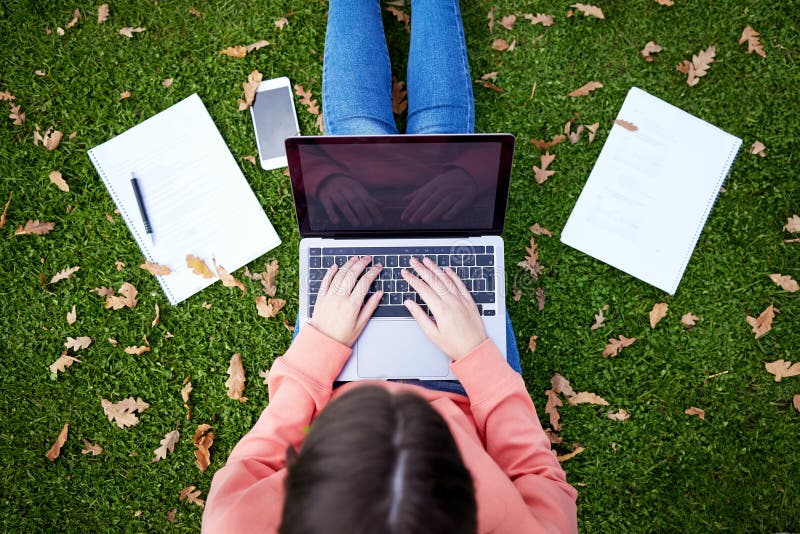 Student, Laptop and Notebook on Grass for Learning, Research and ...