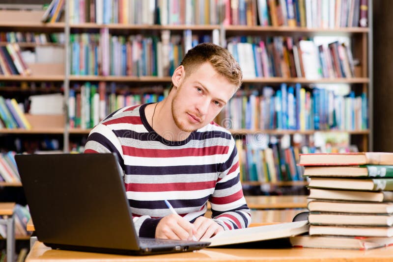 Student with Laptop Studying in the University Library Stock Image ...