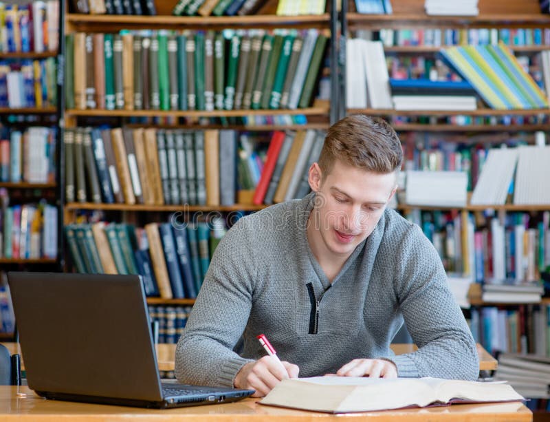 Student with Laptop Studying in the University Library Stock Photo ...