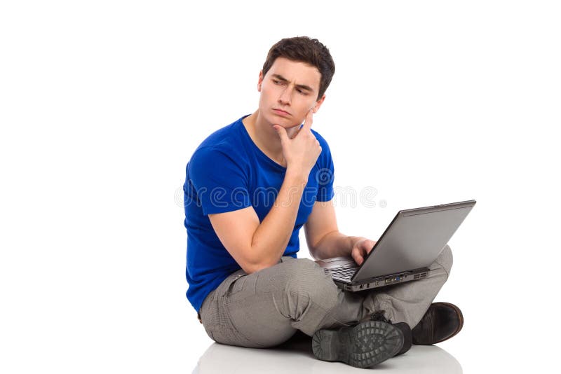 Man using laptop stock photo. Image of floor, computer - 1481330
